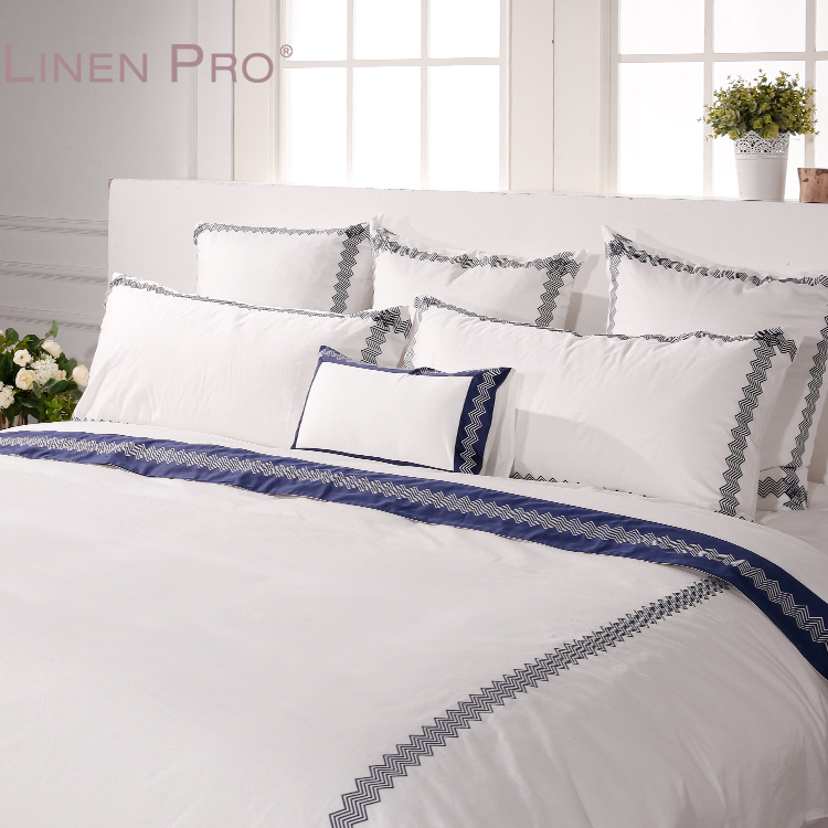 The Art of the Frame: Elevating Suites with Bordered Bedding